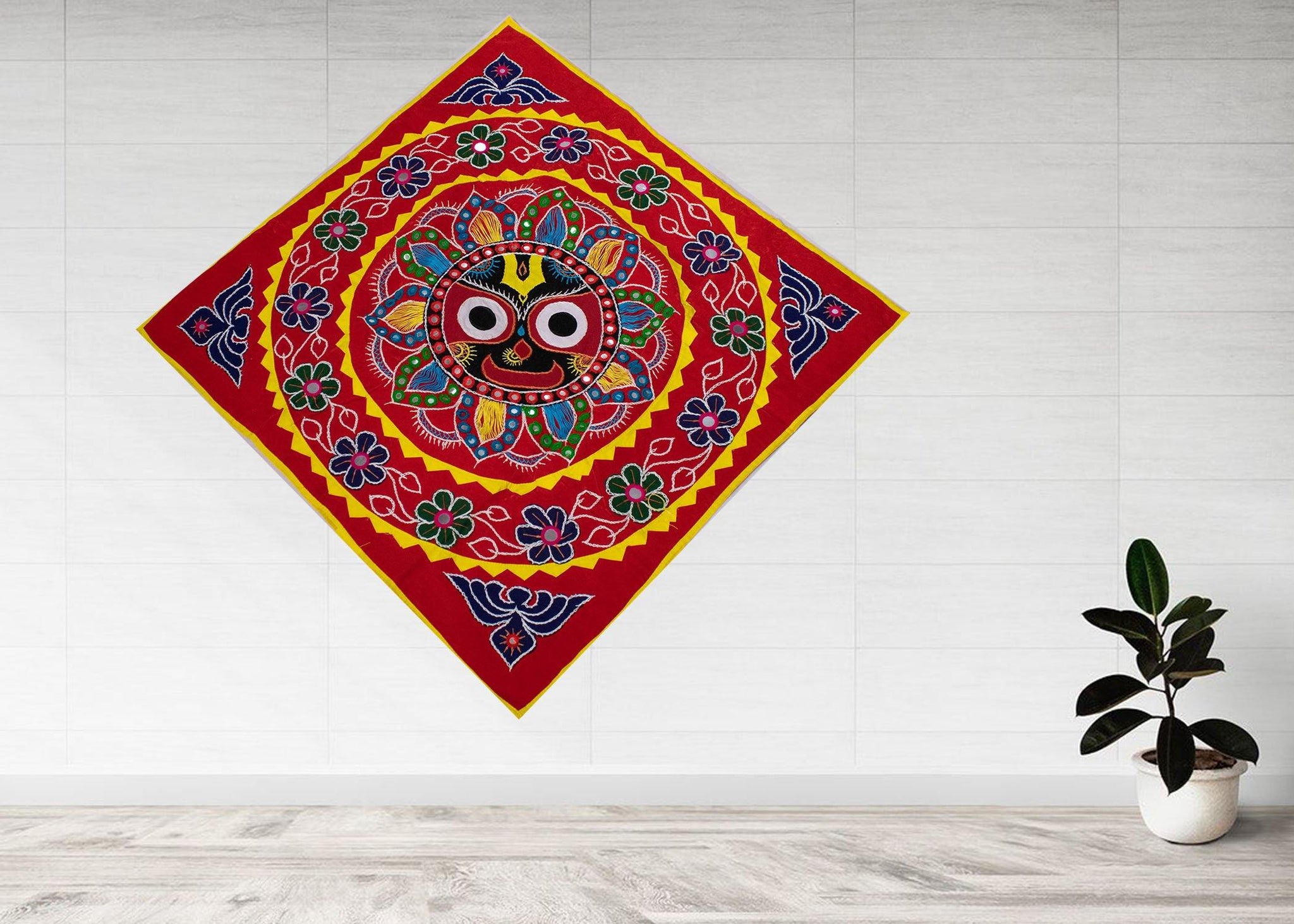 A traditionally Jagannathan design in red yellow and black colour.
